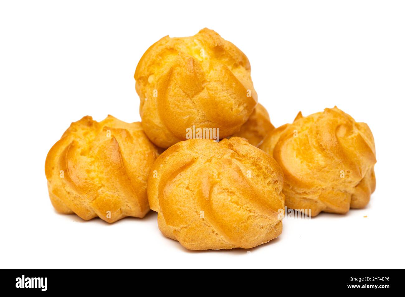 round eclairs on a white background Stock Photo - Alamy