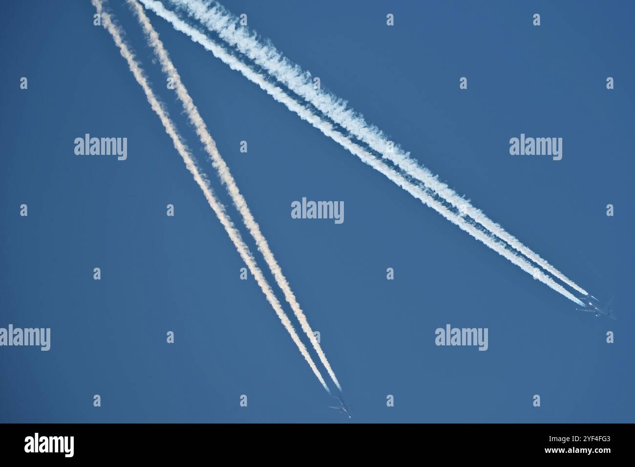 Airplane contrails in clear hi-res stock photography and images - Alamy