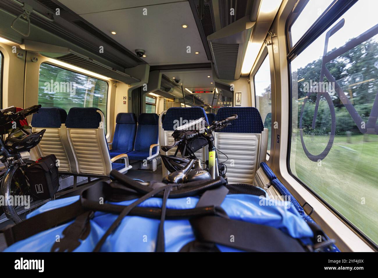 Symbol photo, bicycle parking space on train, e-bike with luggage ...