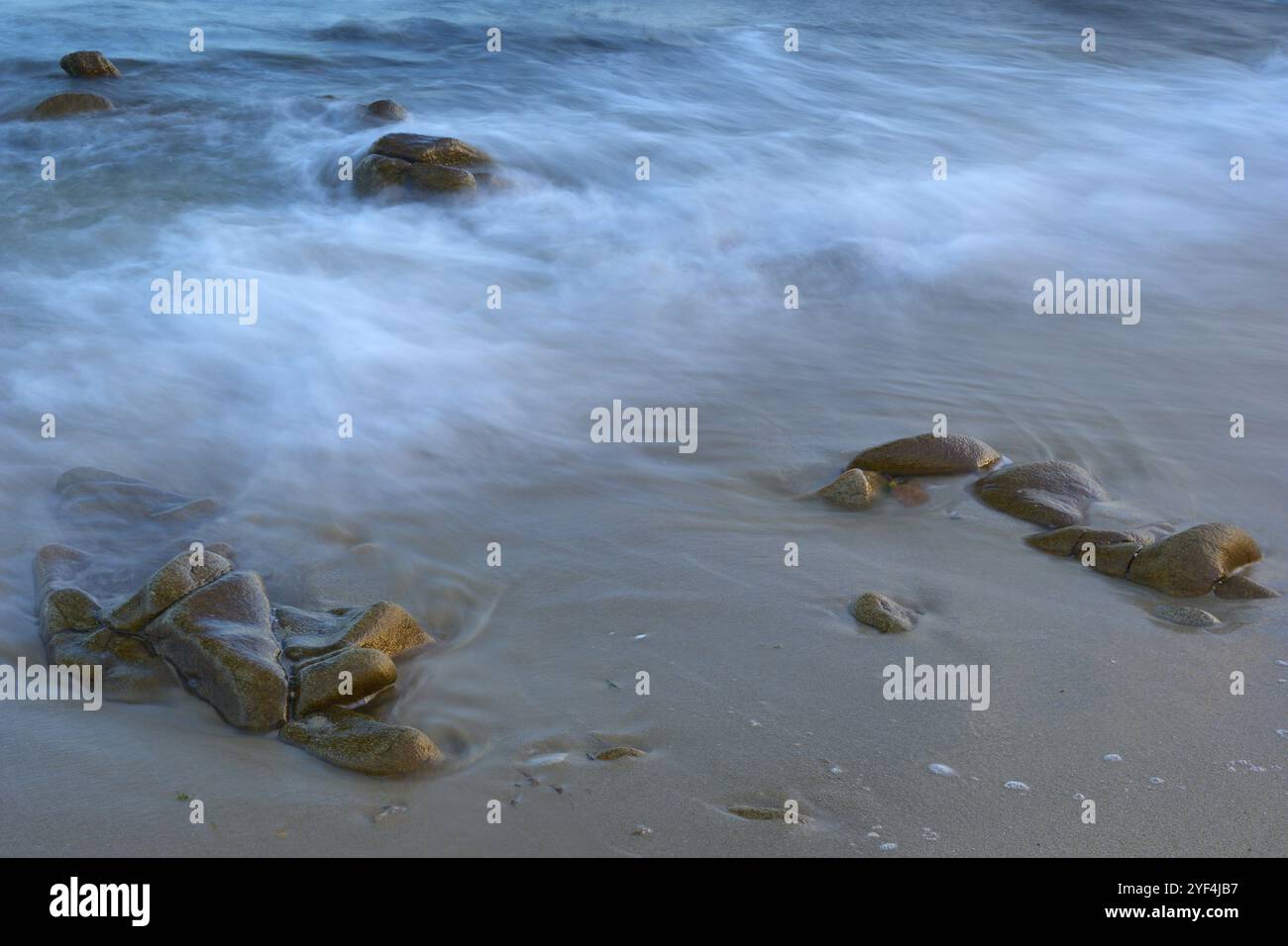 Stones beach soft break wave hi-res stock photography and images - Alamy
