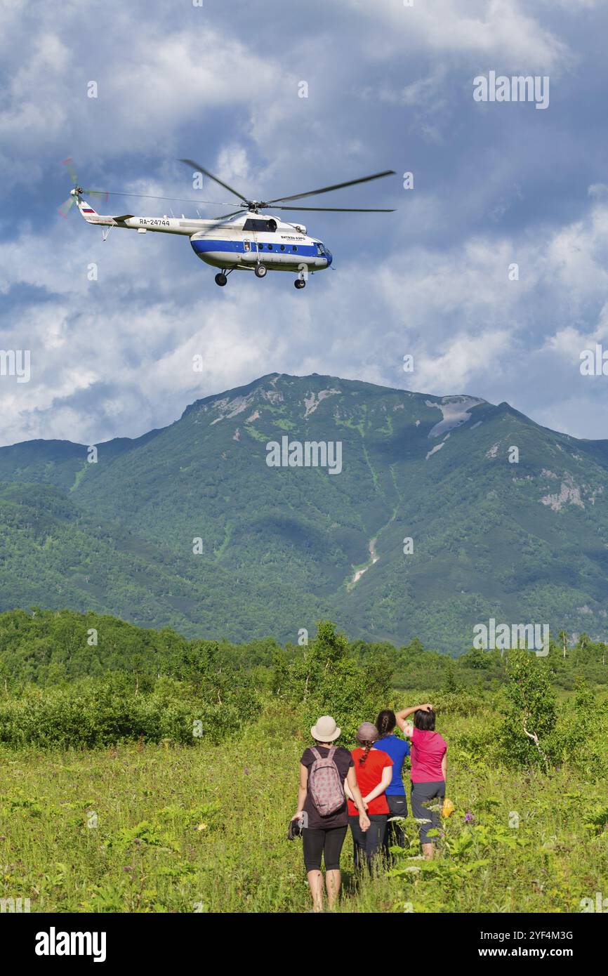 Helicopter people travelers on background hi-res stock photography and ...