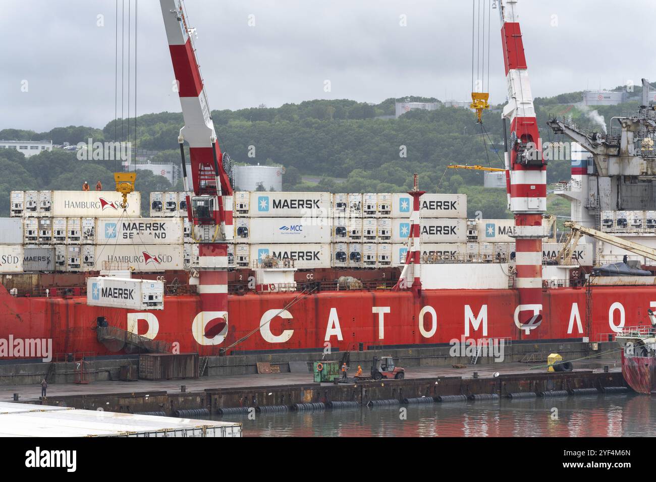 Container terminal commercial sea port, unloaded container ship ...