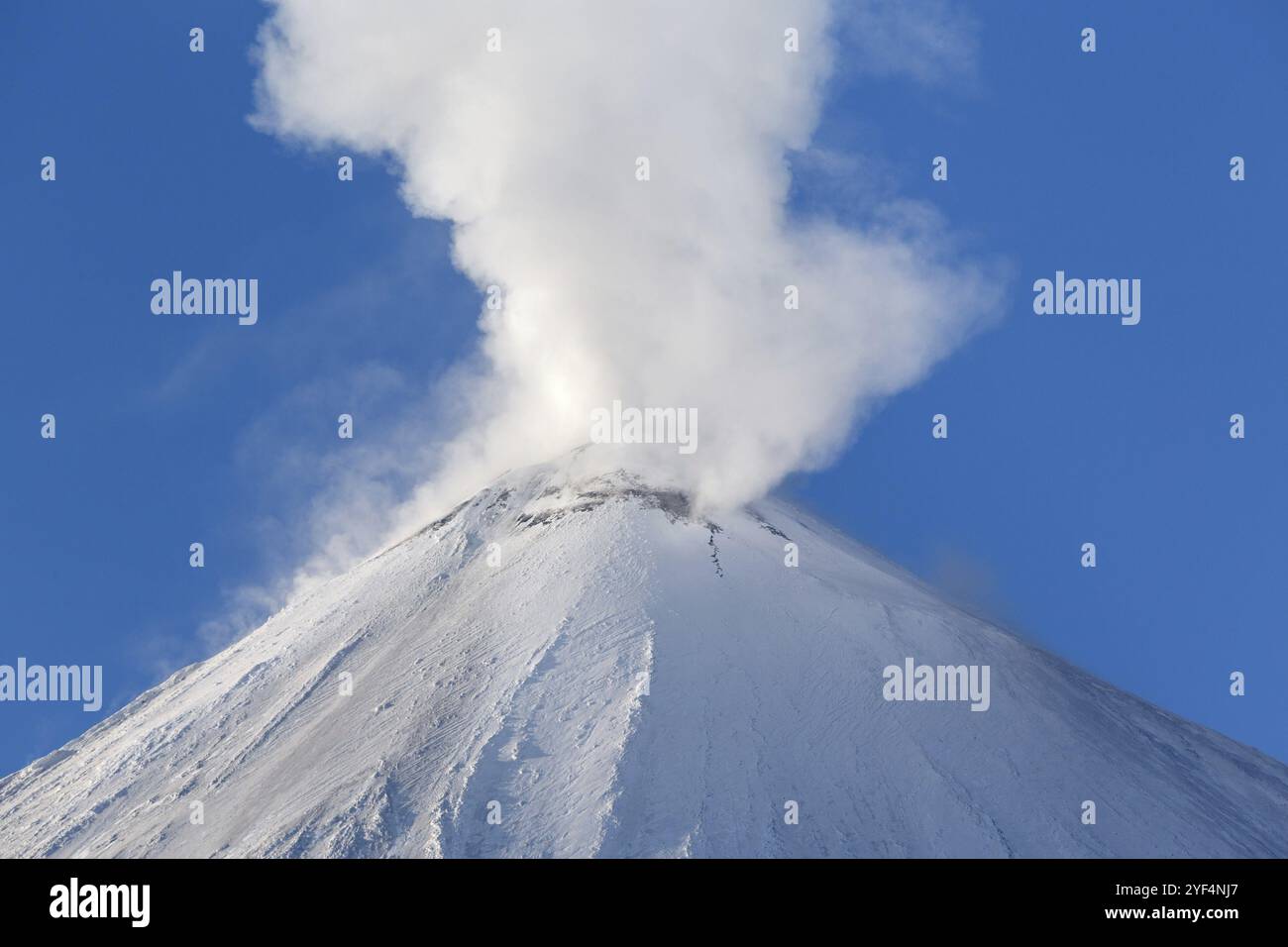 Winter volcanic landscape of Kamchatka Peninsula: active Klyuchevskaya ...