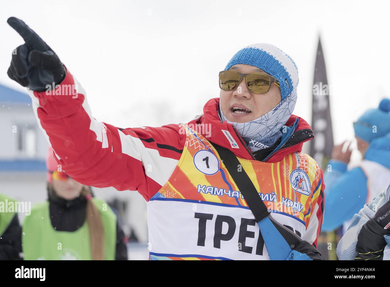 Trainer of South Korea biathlon team instructs biathletes at shooting ...