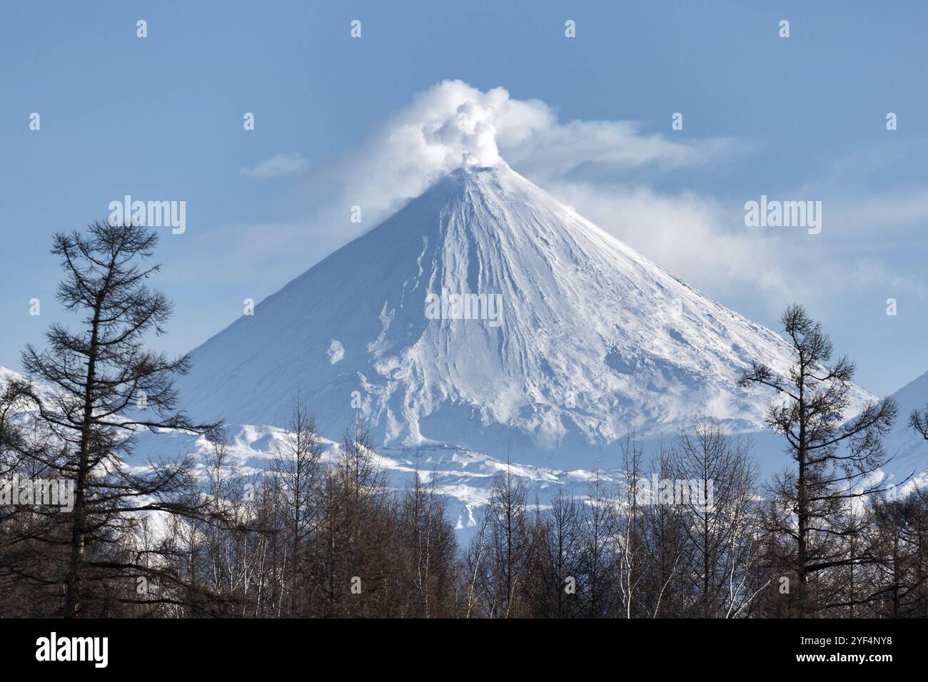 Winter volcanic landscape of Kamchatka Peninsula: view of eruption ...