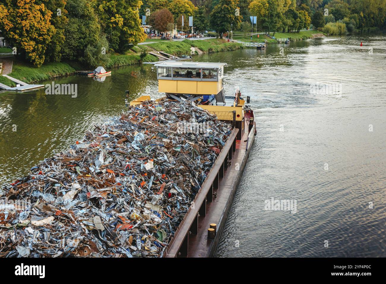 Transportation industry. Ship barge transports scrap metal and sand ...