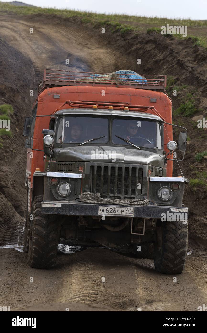 Off-road extreme expedition truck Ural driving on mountain road ...