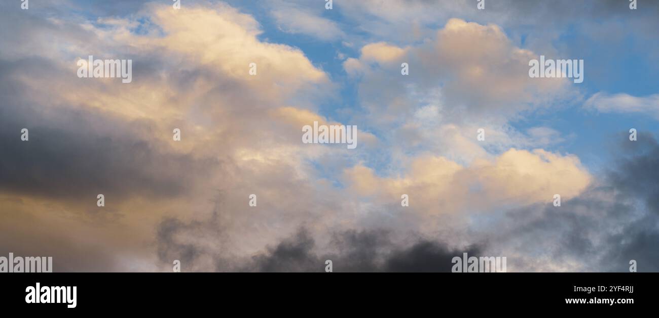 Atmospheric shot fluffy clouds hi-res stock photography and images - Alamy