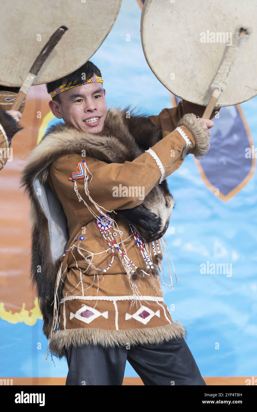 Male expression dancing with tambourine in tradition clothing ...
