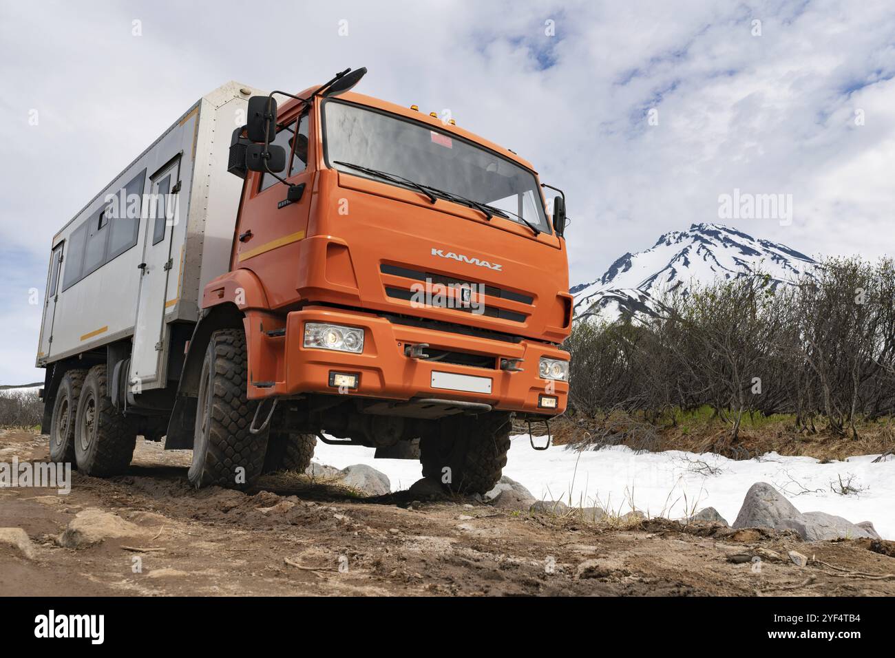 Russian off-road passenger expedition truck KamAZ on mountain road in ...
