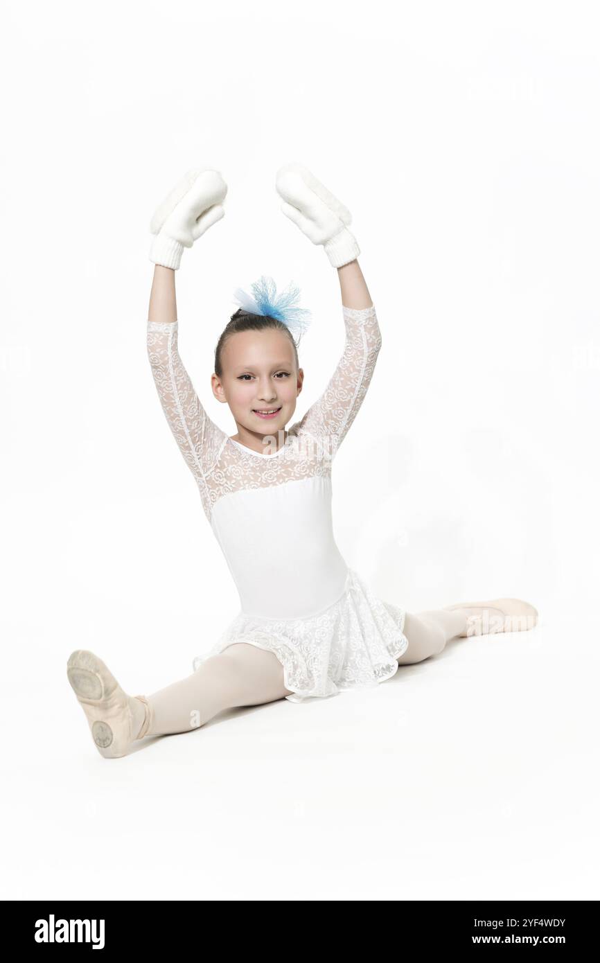 Smiling girl ballet dancer nine-year-old in white ballet tutu skirt ...