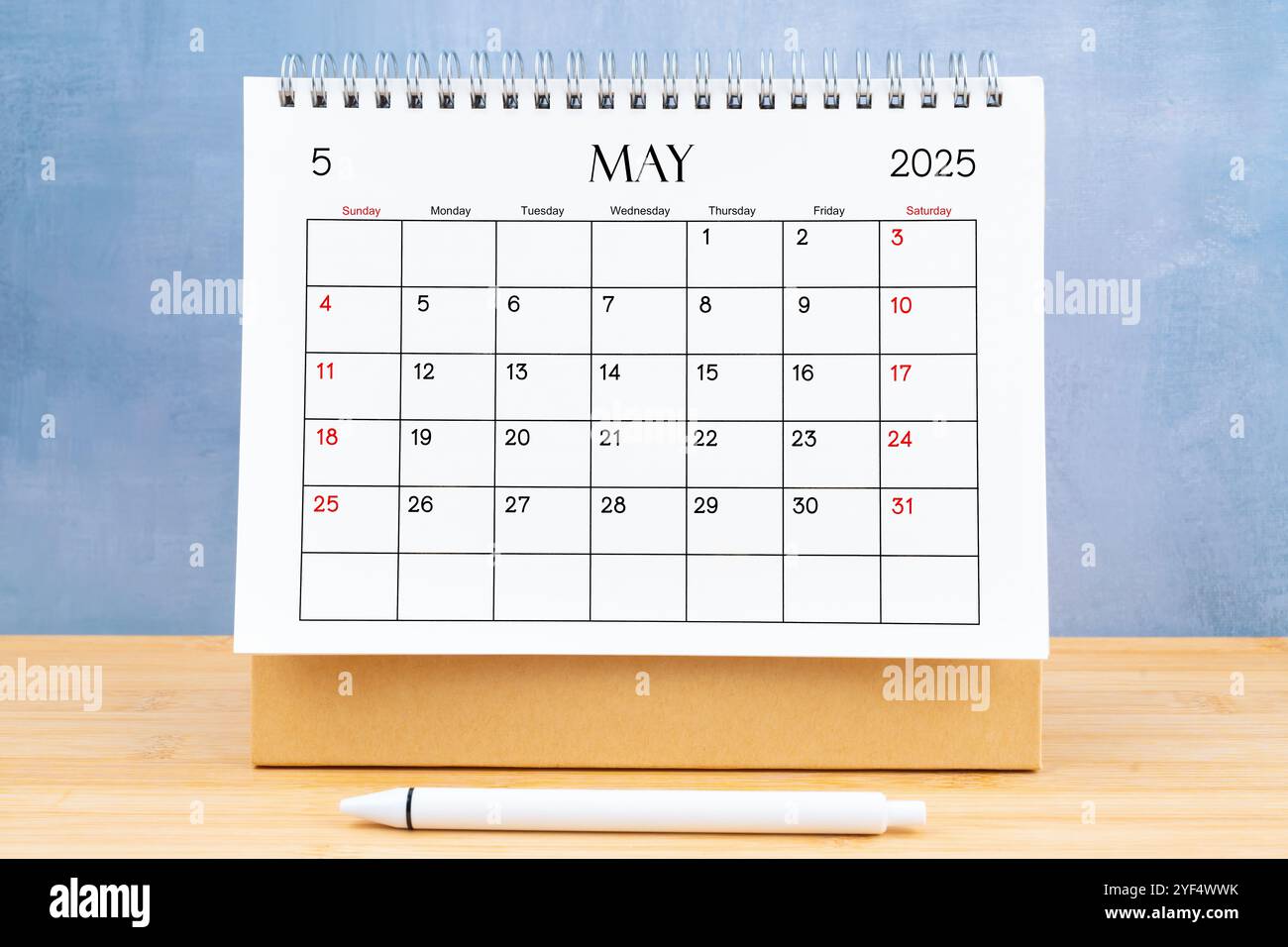 May 2025, Monthly desk calendar for 2025 year on wooden table Stock ...