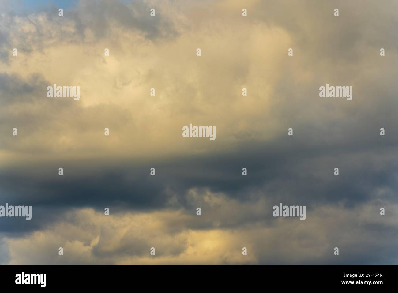 Summer clouds floating across sunny sky to change weather. Natural ...