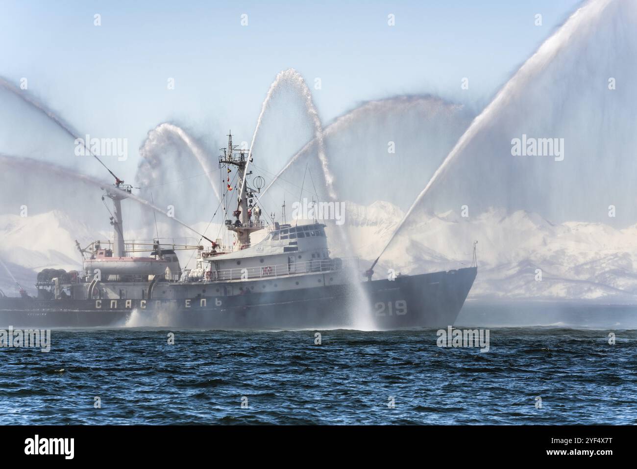 KAMCHATKA, RUSSIA, APR 27, 2019: Rescue and salvage ship of Pacific Fleet of Russia spraying ...