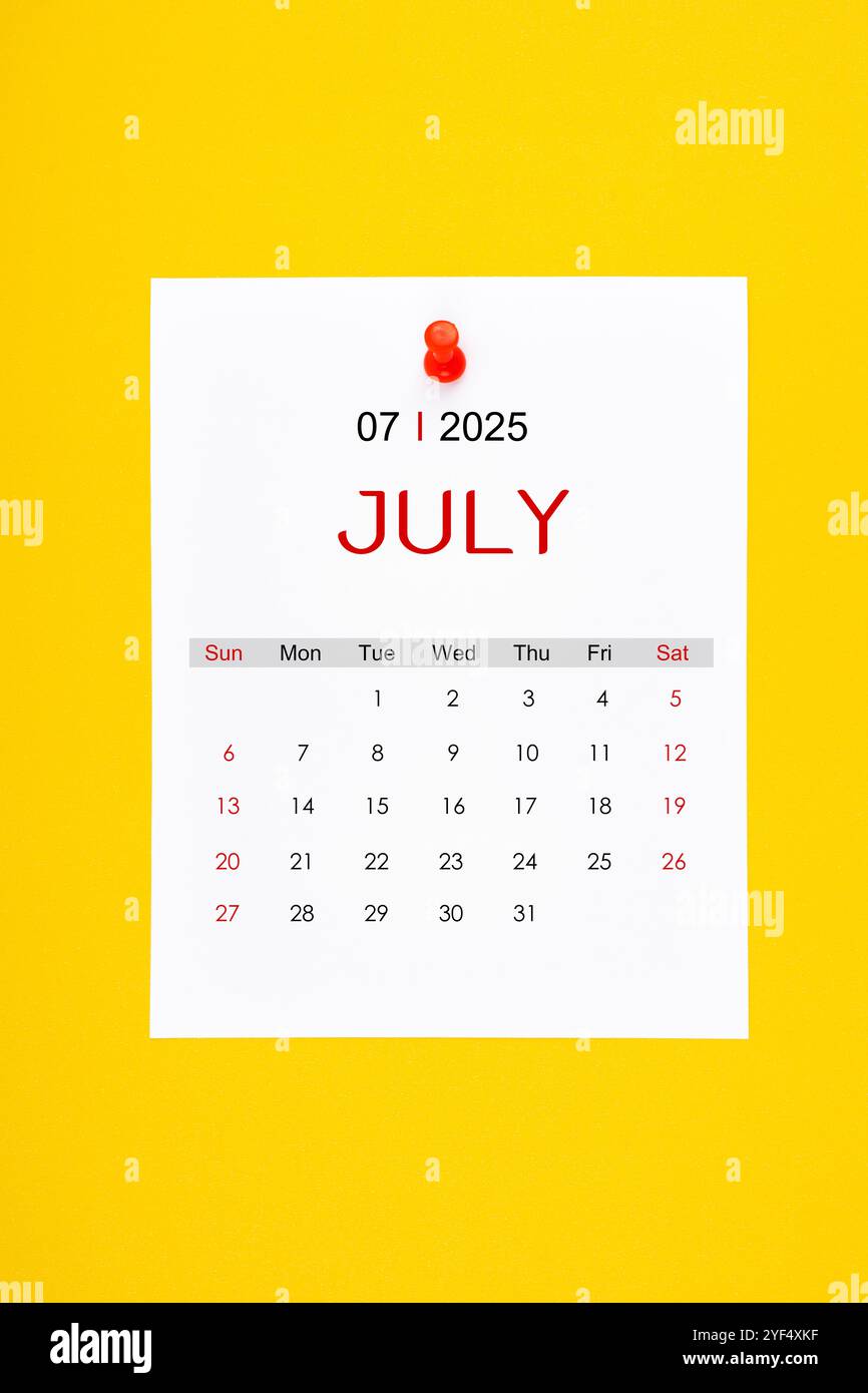 July 2025 calendar page with push pin on yellow color background Stock ...