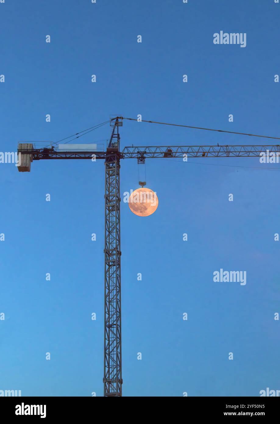 The moon lifted by a crane Stock Photo - Alamy