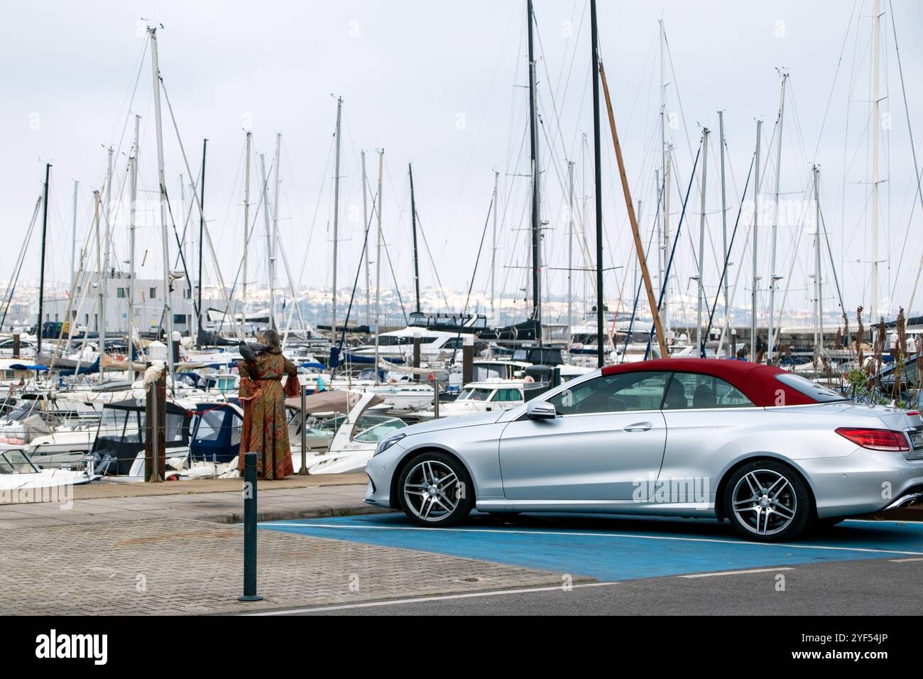Luxury car parked in the port of Cascais, Portugal Stock Photo - Alamy