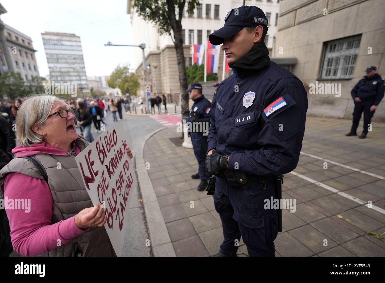 A woman shouts slogans during a protest, two days after a concrete ...