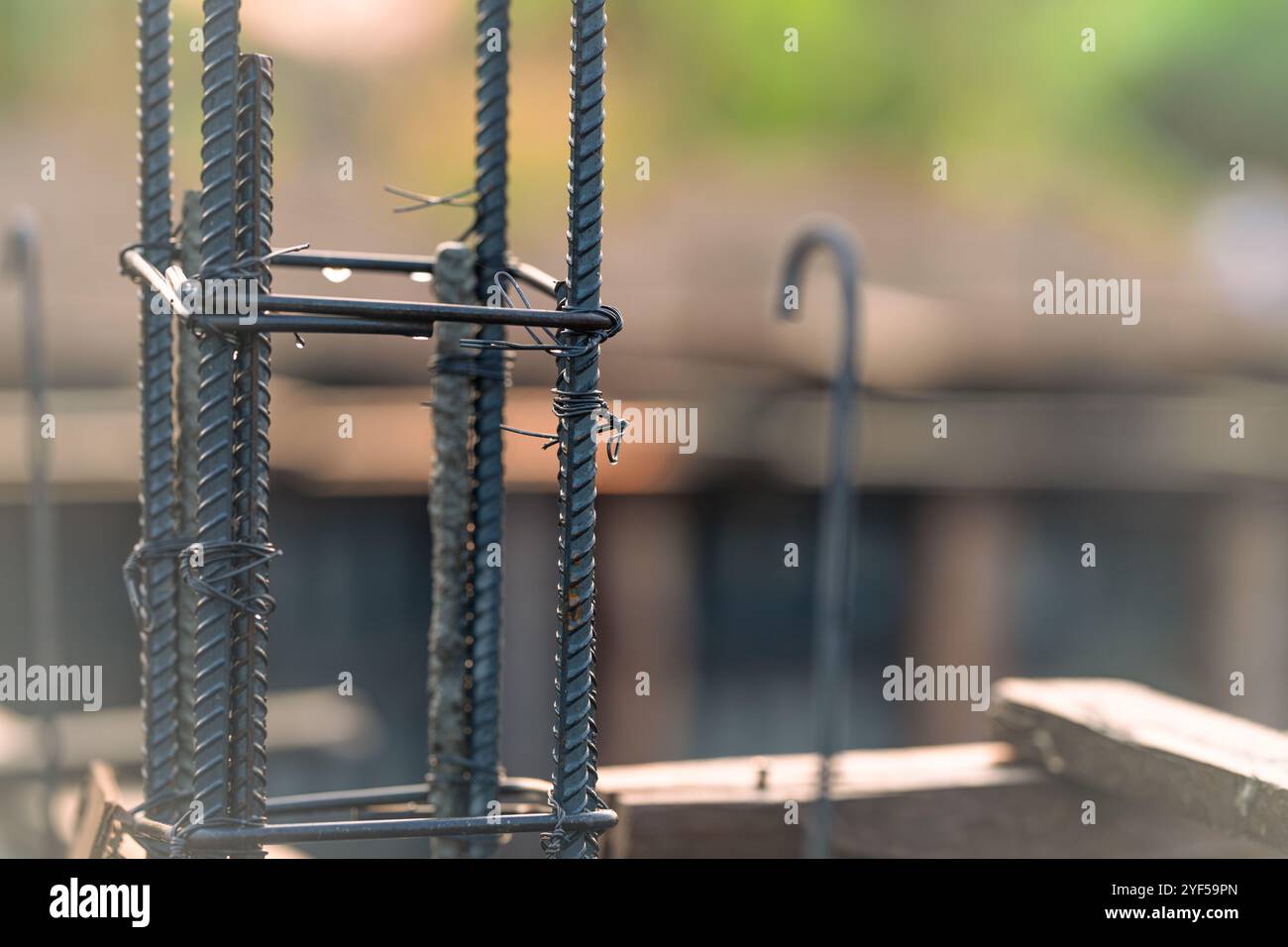 Concrete footings and reinforcing steel rods at a construction site ...