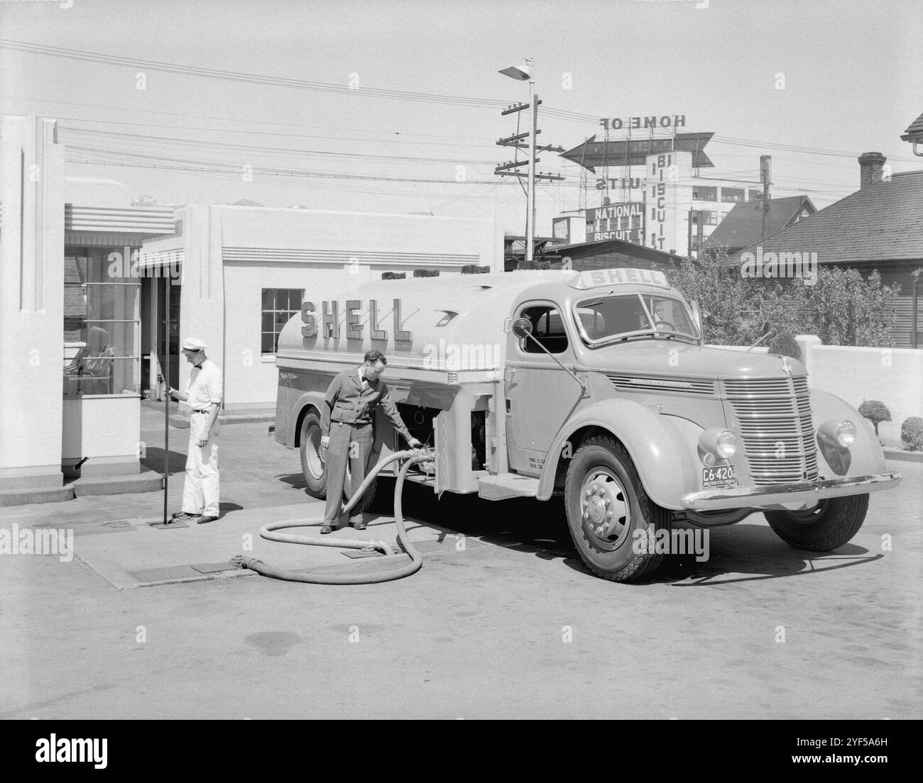 Shell Oil truck making delivery to a gas station, 1937. Vintage Archive ...