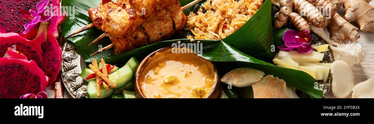 A traditional indonesian chicken satay, served with steamed rice and ...