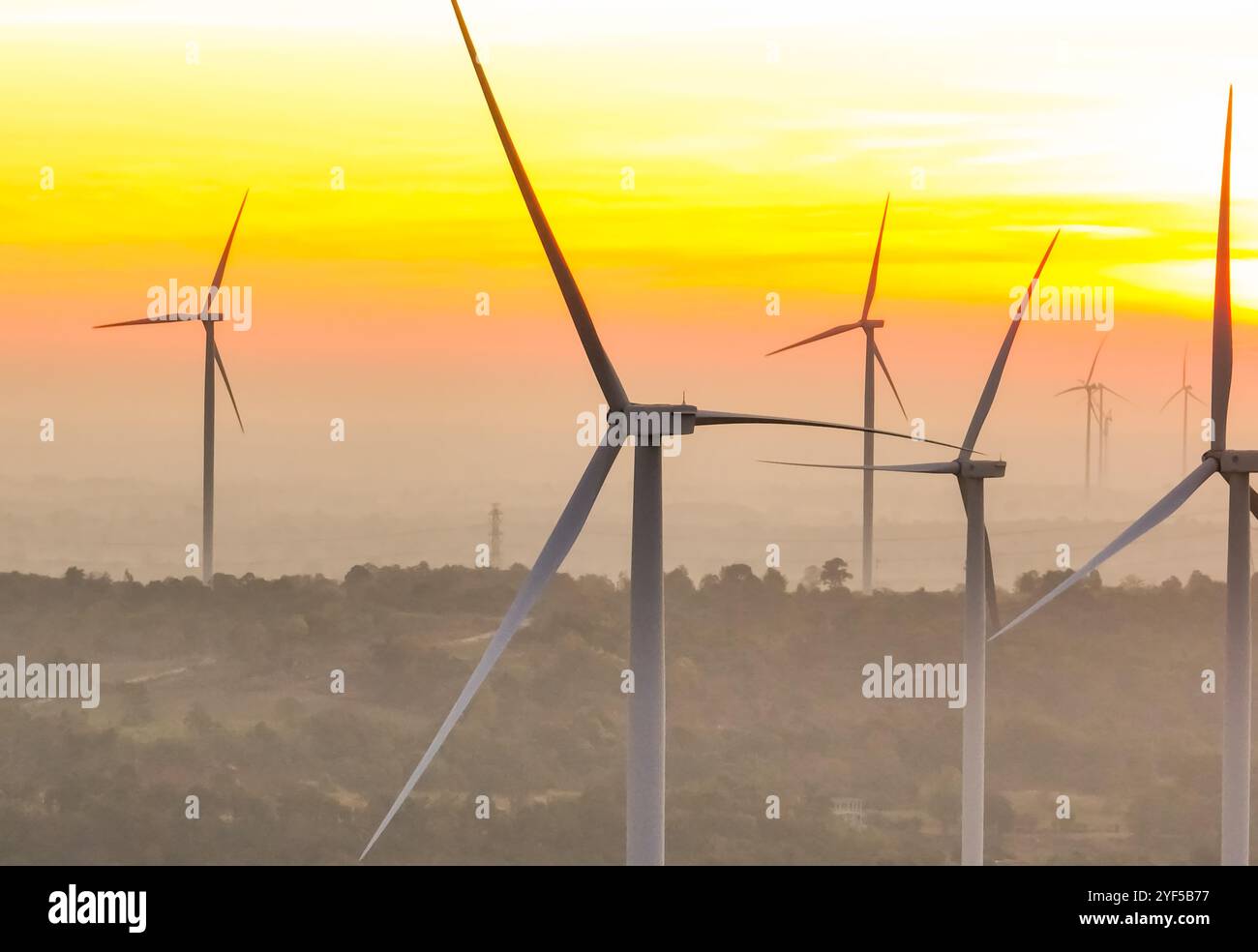 Wind farm field and sunset sky. Wind power. Sustainable, renewable ...