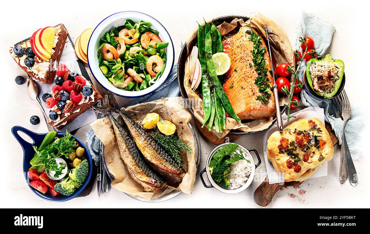 Assorted healthy seafood on plates for dinner or lunch. traditional ...