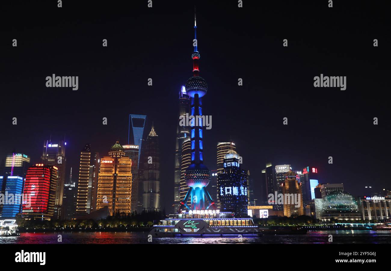 Shanghai. 3rd Nov, 2024. Landmarks are lit up to welcome the 7th China ...