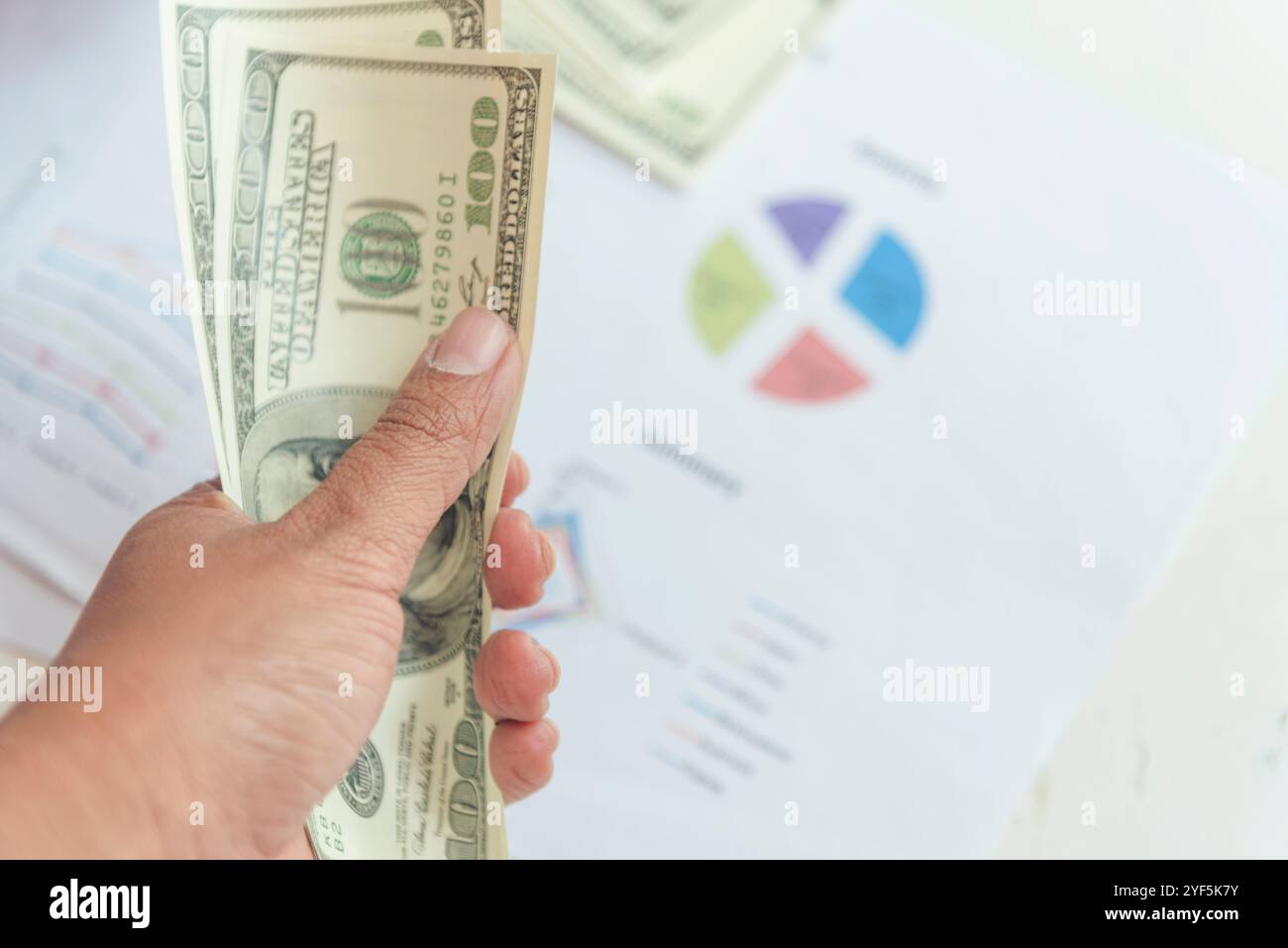 Hand holding loan money dollar bank note give financial payment. Man ...