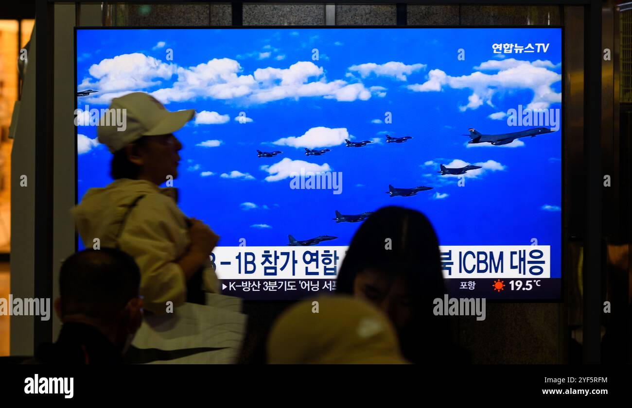 A 24-hour Yonhapnews TV broadcast at Yongsan Railway Station in Seoul ...