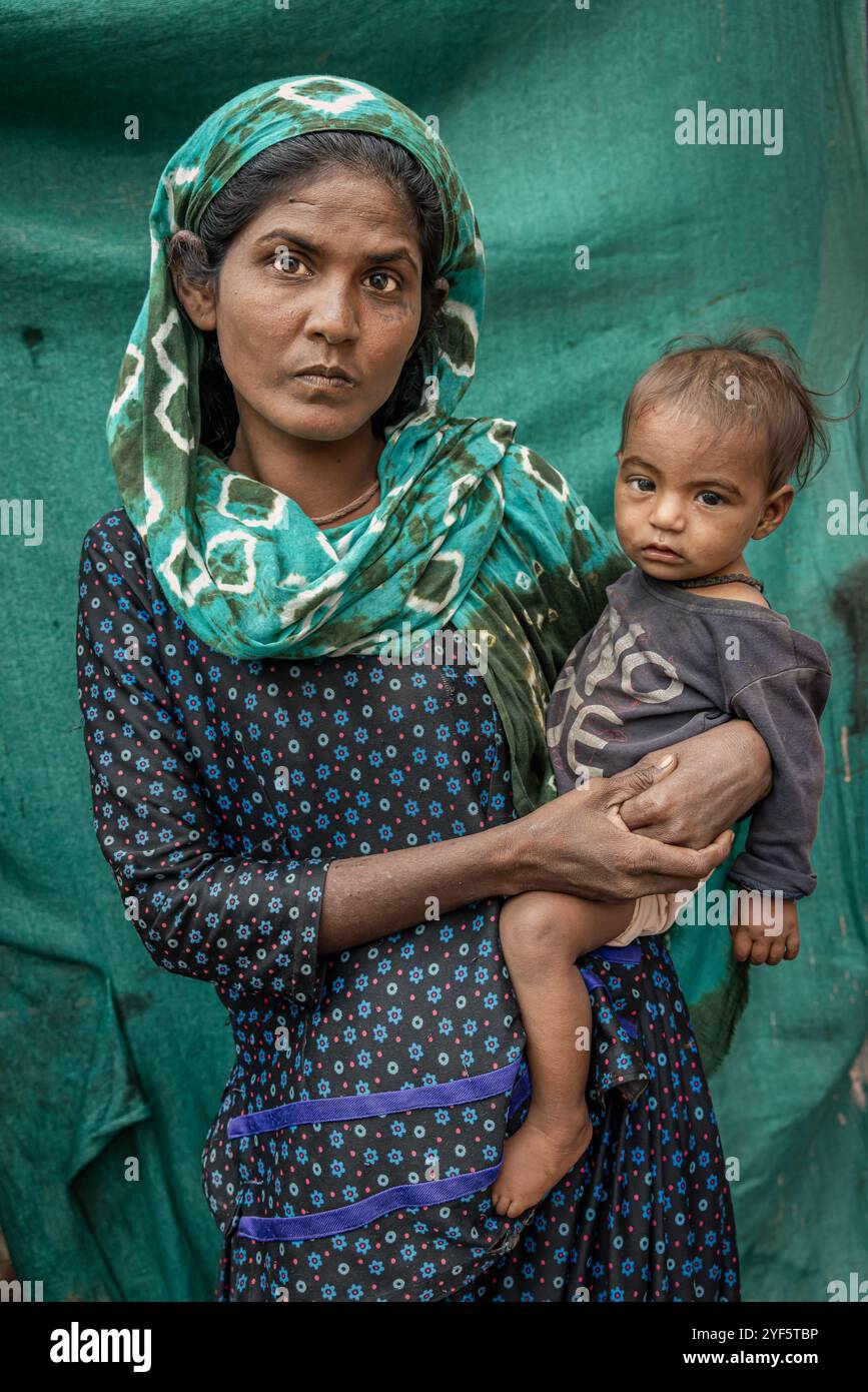 Portrait of poor woman and baby, Ambaji, Gujarat, India Stock Photo - Alamy