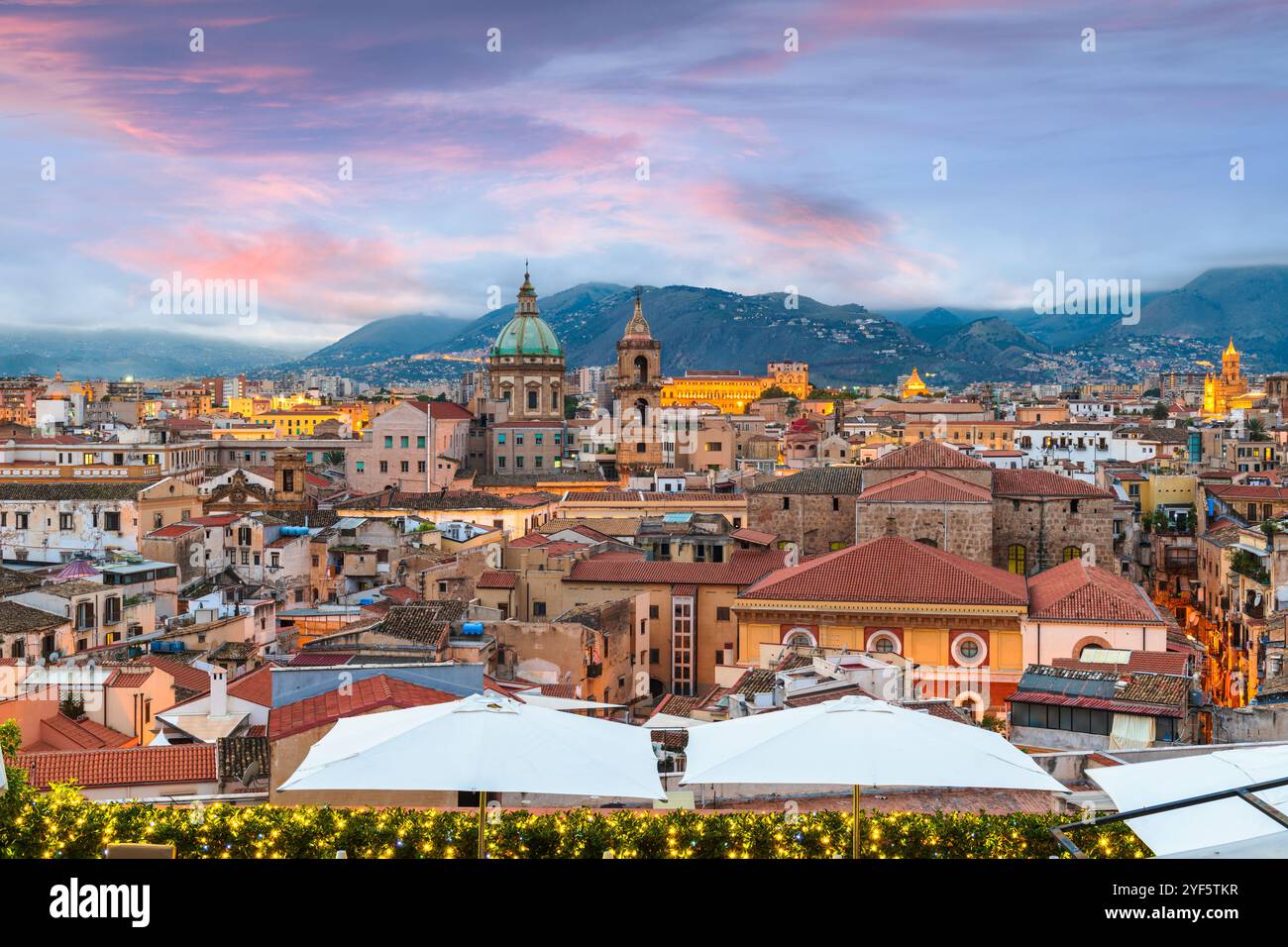 Palermo, Sicily town skyline with landmark towers at dusk Stock Photo ...