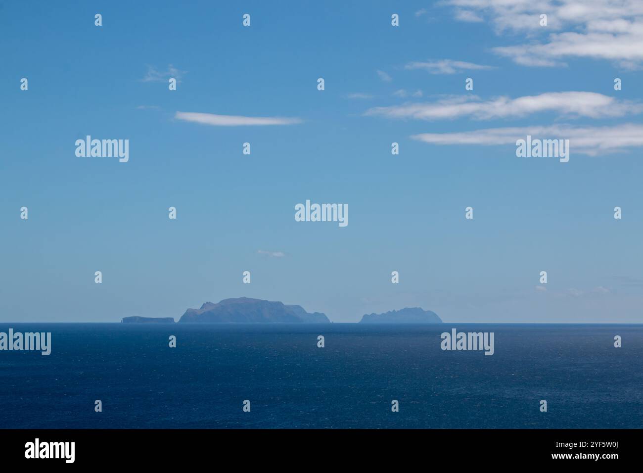 Calm water of Atlantic ocean. Small islands belonging to Madeira on the ...