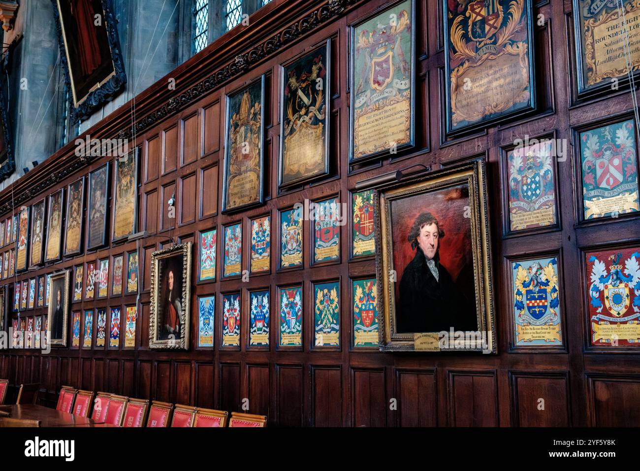Lincoln’s Inn Great Hall with historic coat of arms and portraits on ...