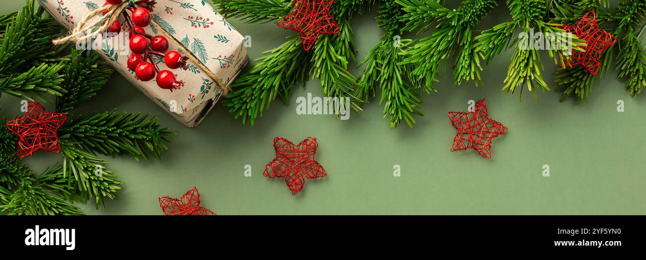 Christmas festive banner, fir branches and gift boxes with a sprig of ...