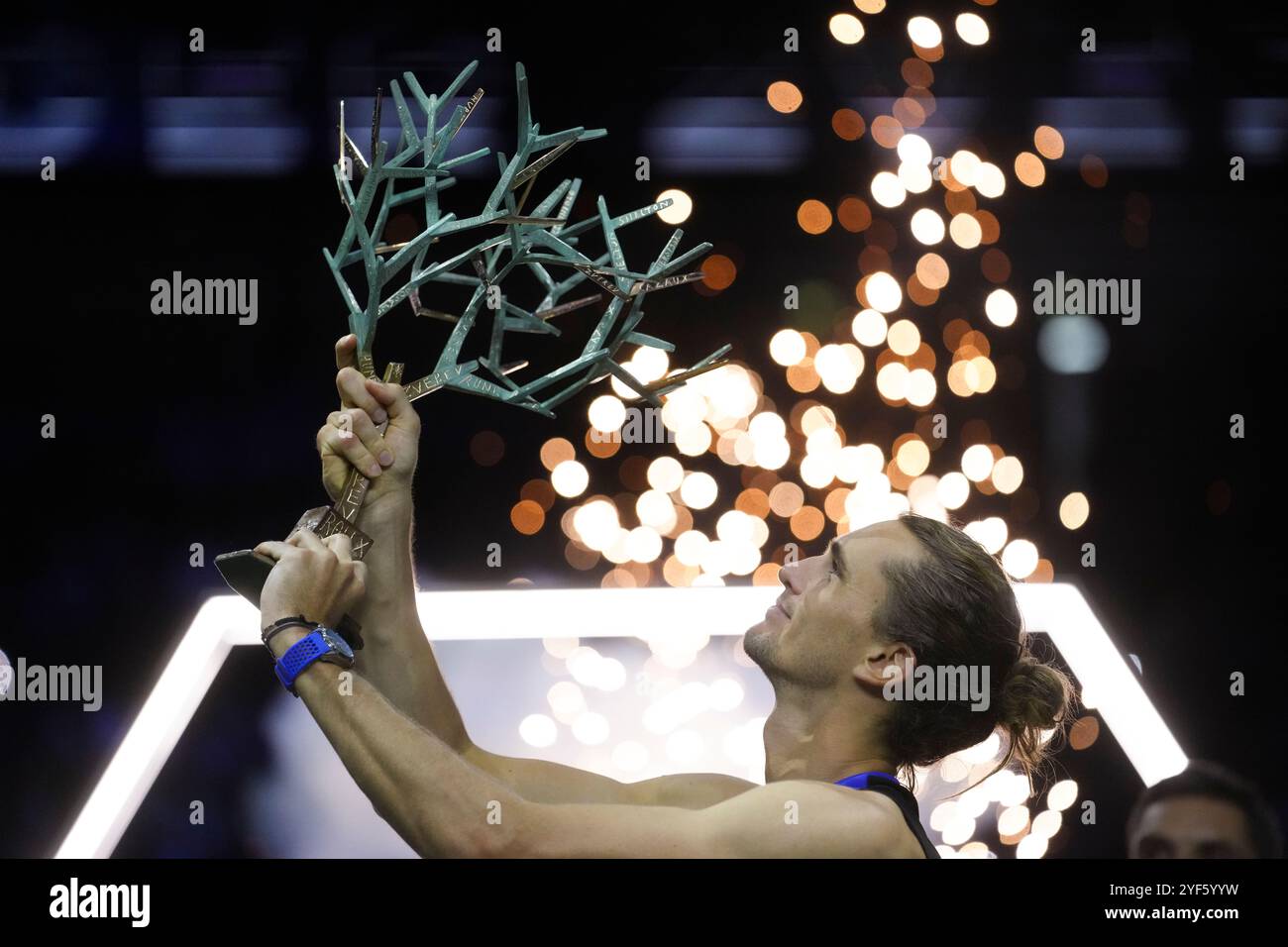 Germany's Alexander Zverev lifts the trophy after winning the final of ...