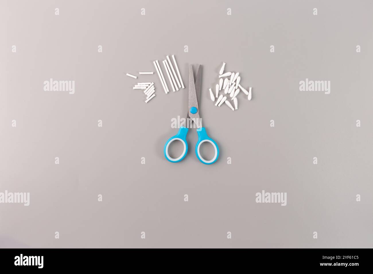 cotton swabs cut with scissors on a grey background. step in creative ...
