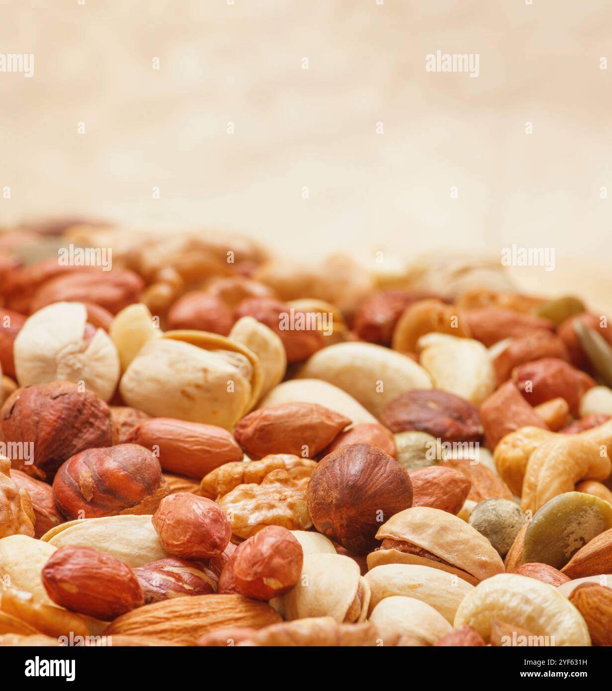 Variety of nuts and seeds closeup with selective focus - peeled walnut ...
