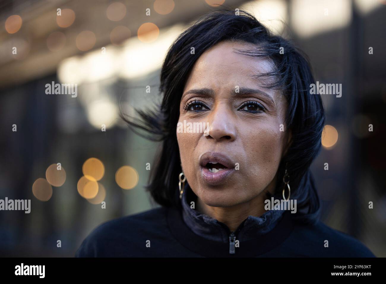 Maryland Democratic senatorial candidate Angela Alsobrooks speaks with a reporter after greeting ...
