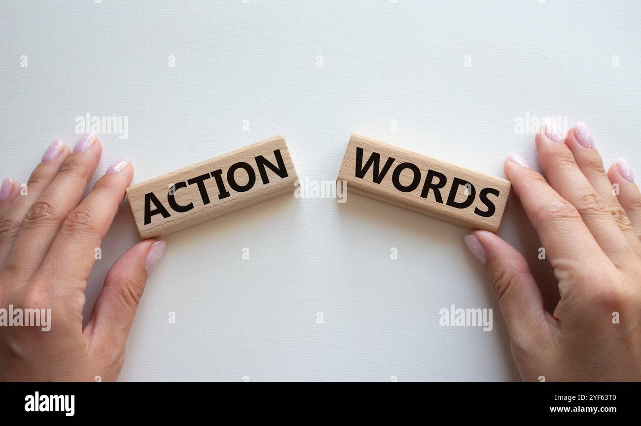 Action or words symbol. Concept word Action or words on wooden blocks ...