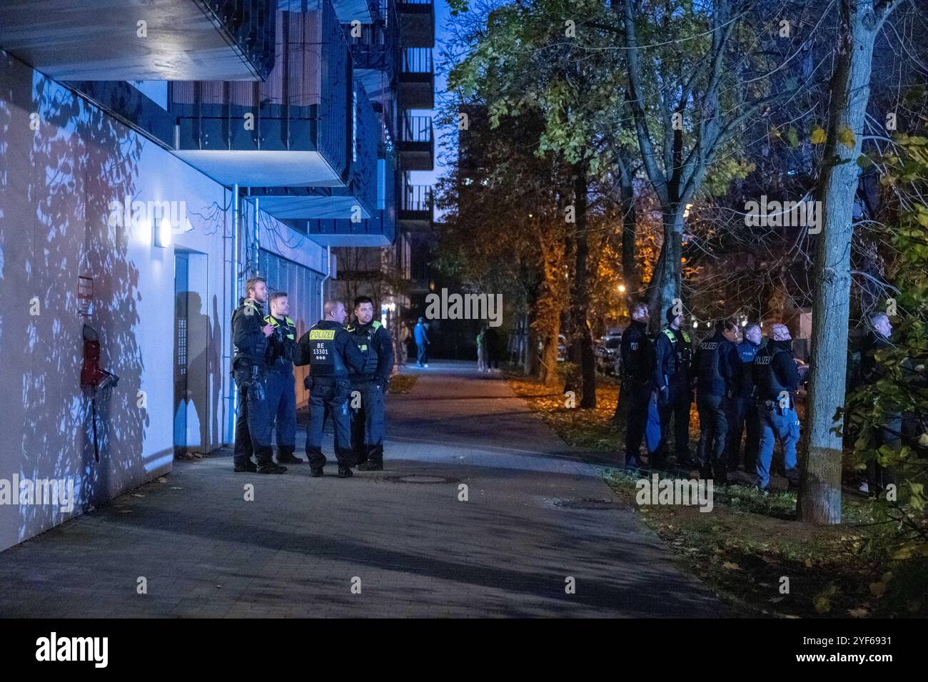 Berlin, Germany. 03rd Nov, 2024. Police officers stand in front of an ...