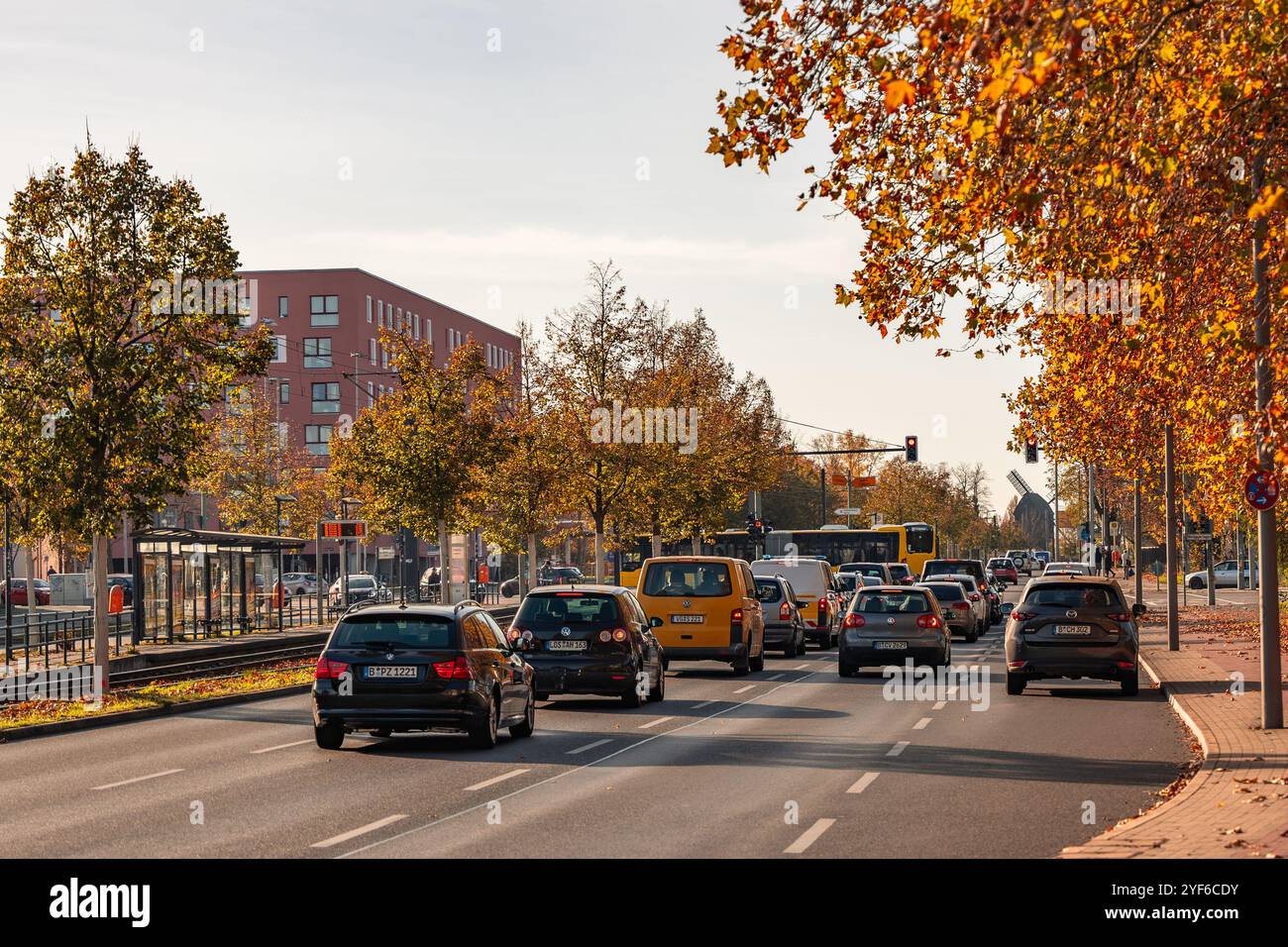 Germany Berlin November 3, 2024. Busy street with cars and buses. The ...