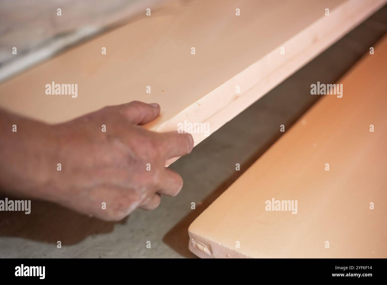 Laying polystyrene foam on the floor. Thermal insulation of the floor ...