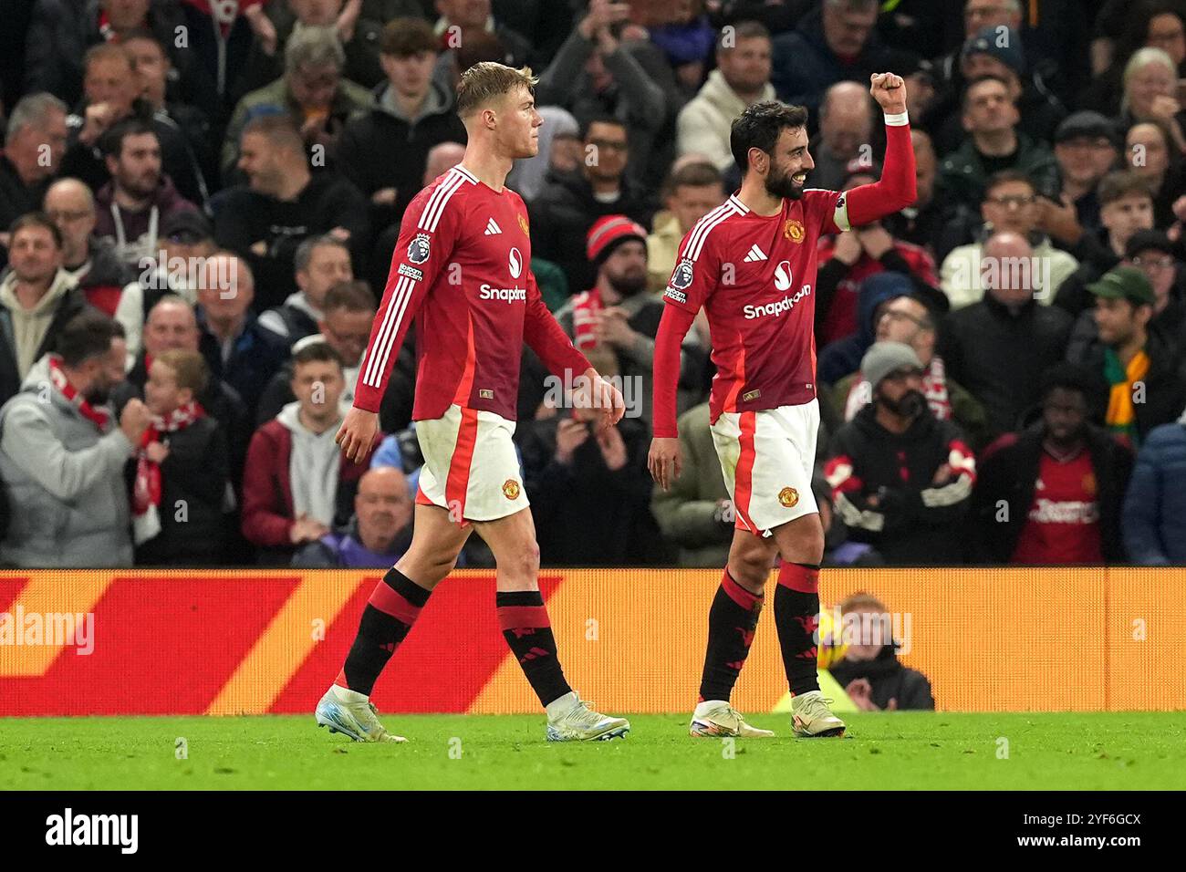 Manchester United's Bruno Fernandes (right) celebrates scoring their ...