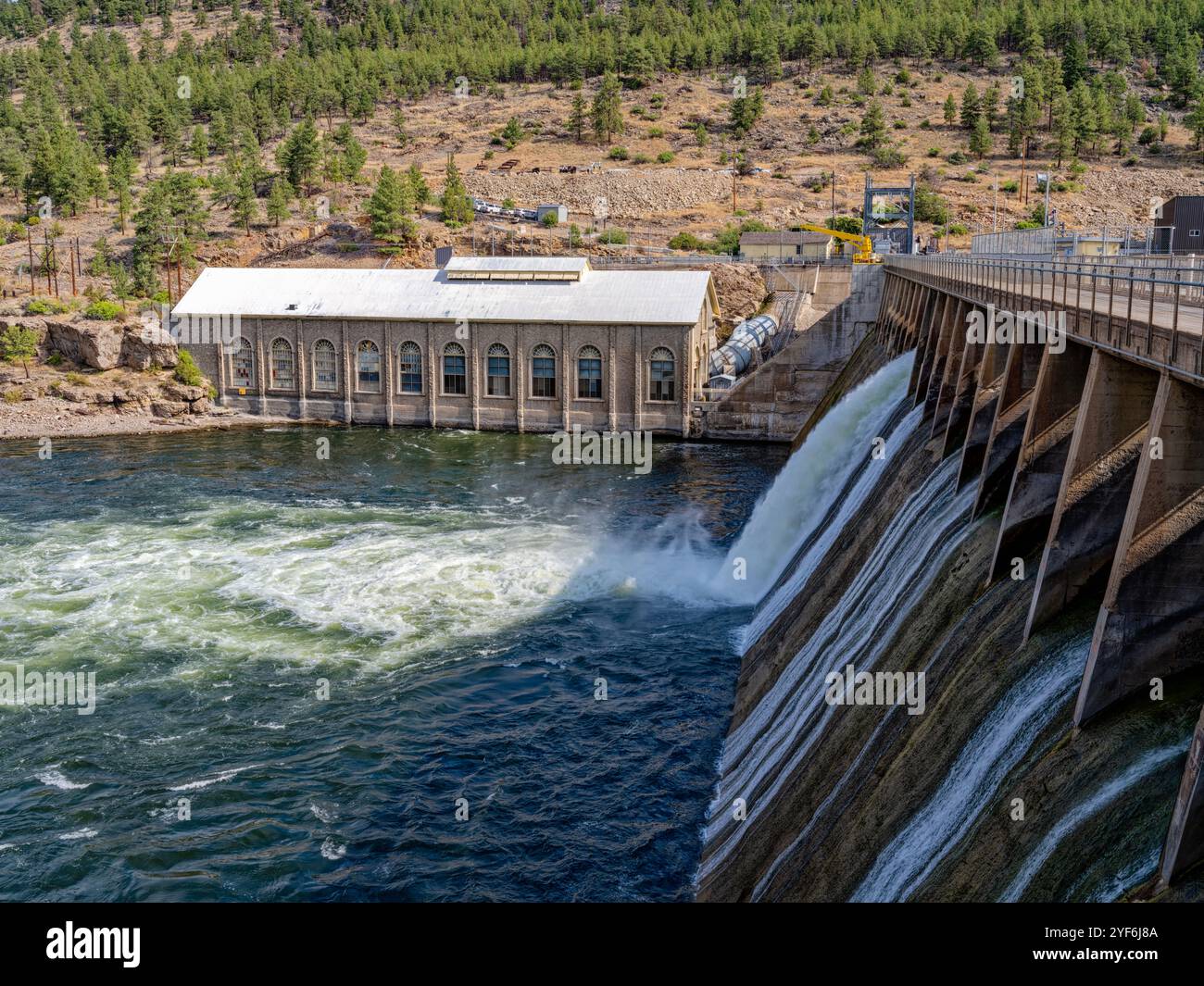 The spillway and powerhouse of the Hauser Dam on the Missouri River ...