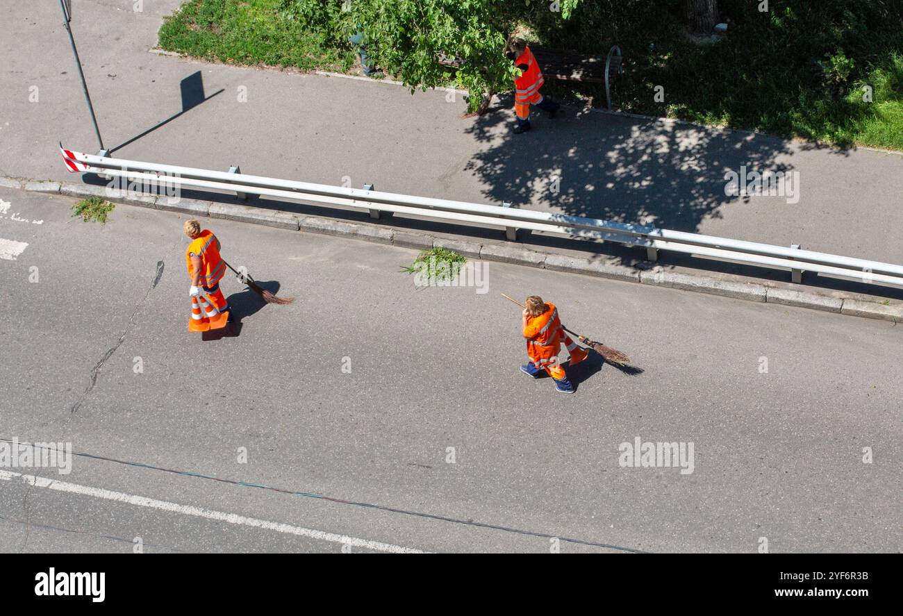 Employee sweeping street hi-res stock photography and images - Alamy