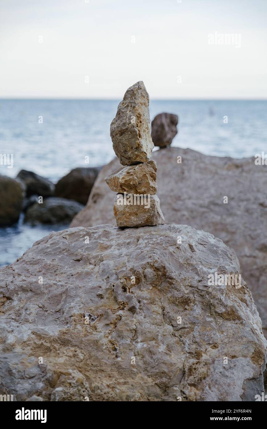 Stone pyramids on the beach Stock Photo - Alamy