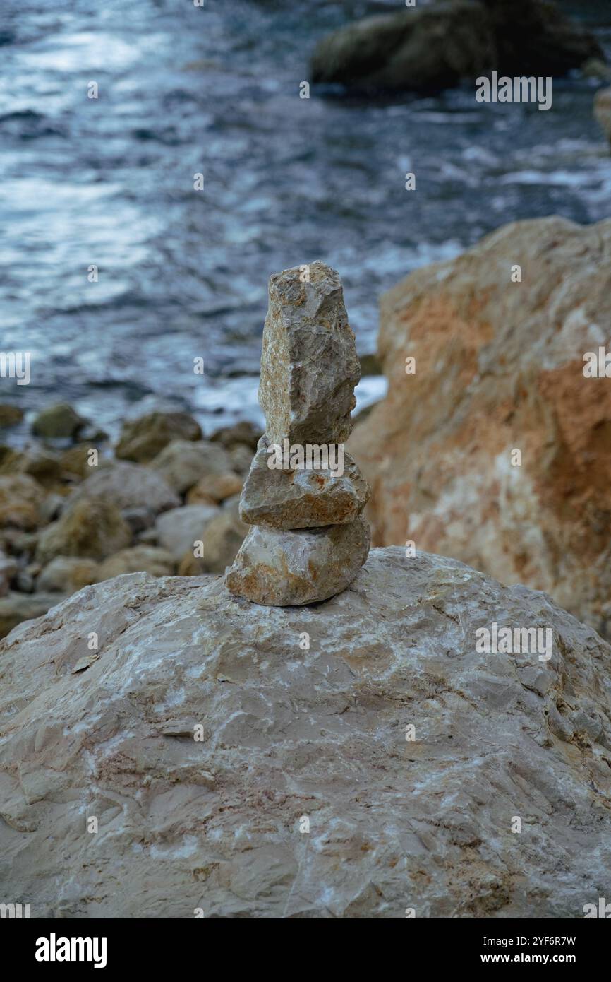 Stone pyramids on the beach Stock Photo - Alamy