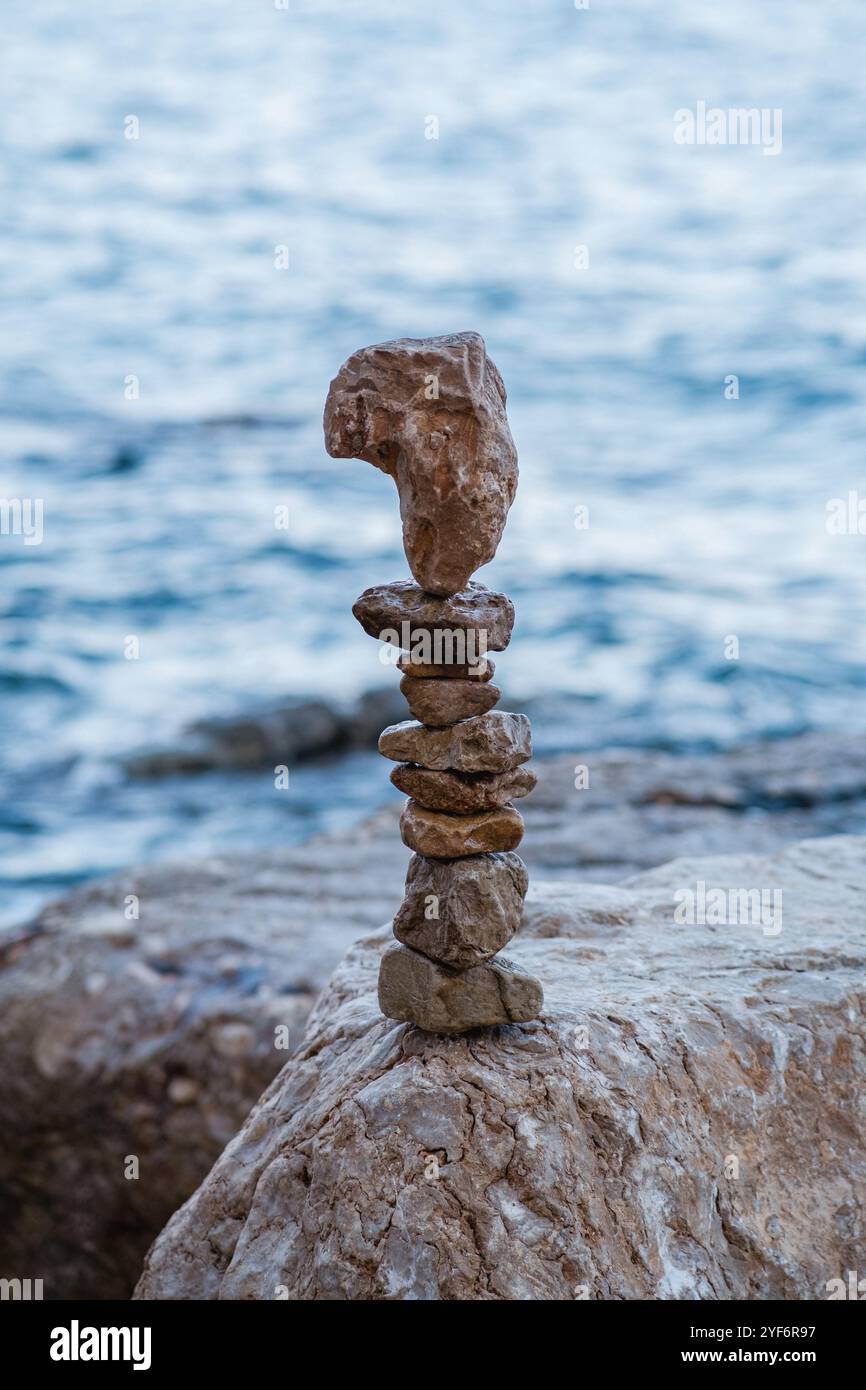 Stone pyramids on the beach Stock Photo - Alamy