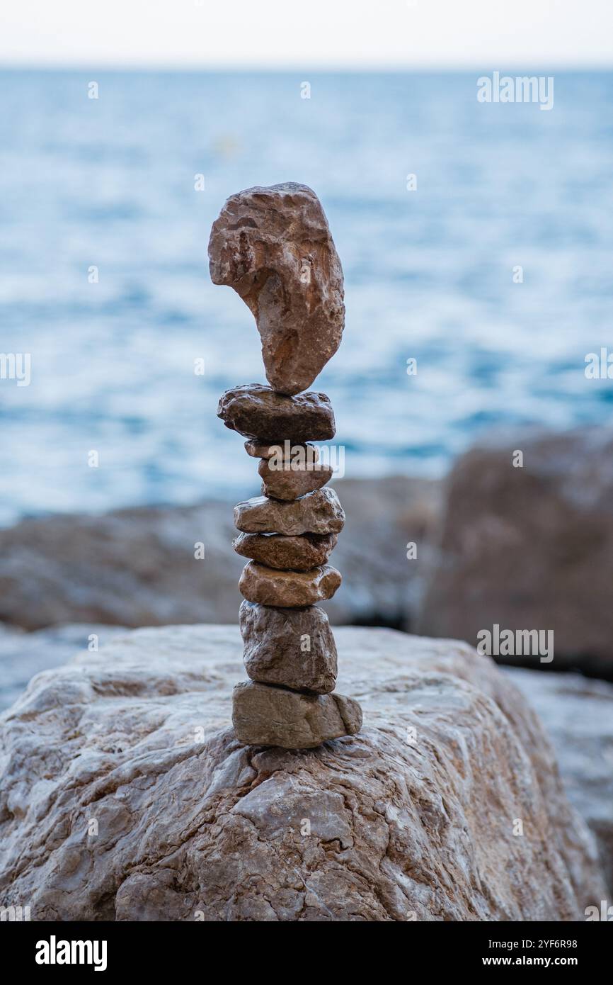 Stone pyramids on the beach Stock Photo - Alamy
